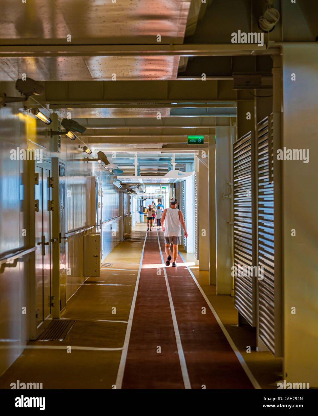 Runners on Ship Fitness Path Stock Photo - Alamy