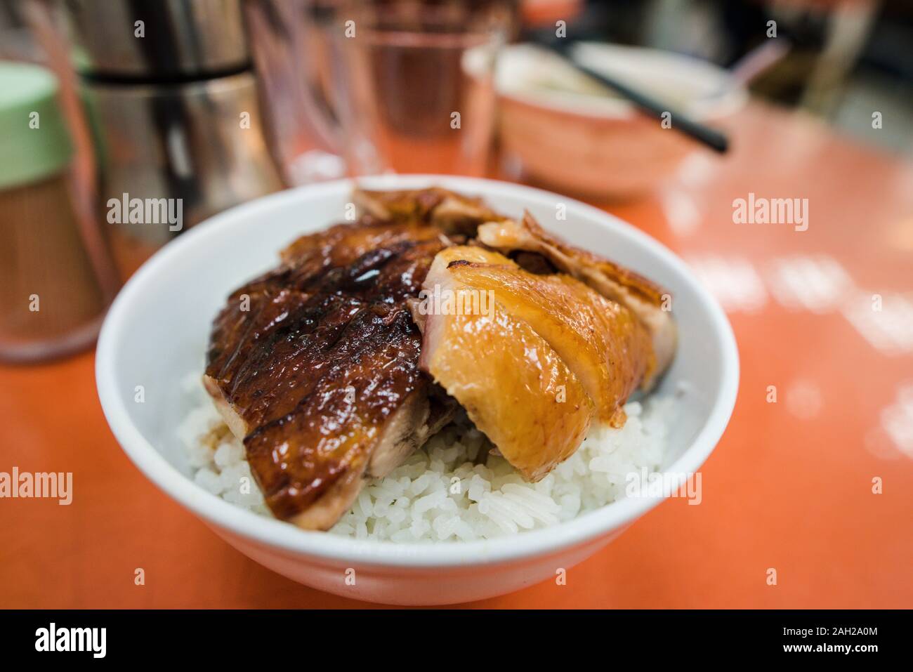 This is Beijing Duck Rice. We eat duck meat with sweet sauce on white ...