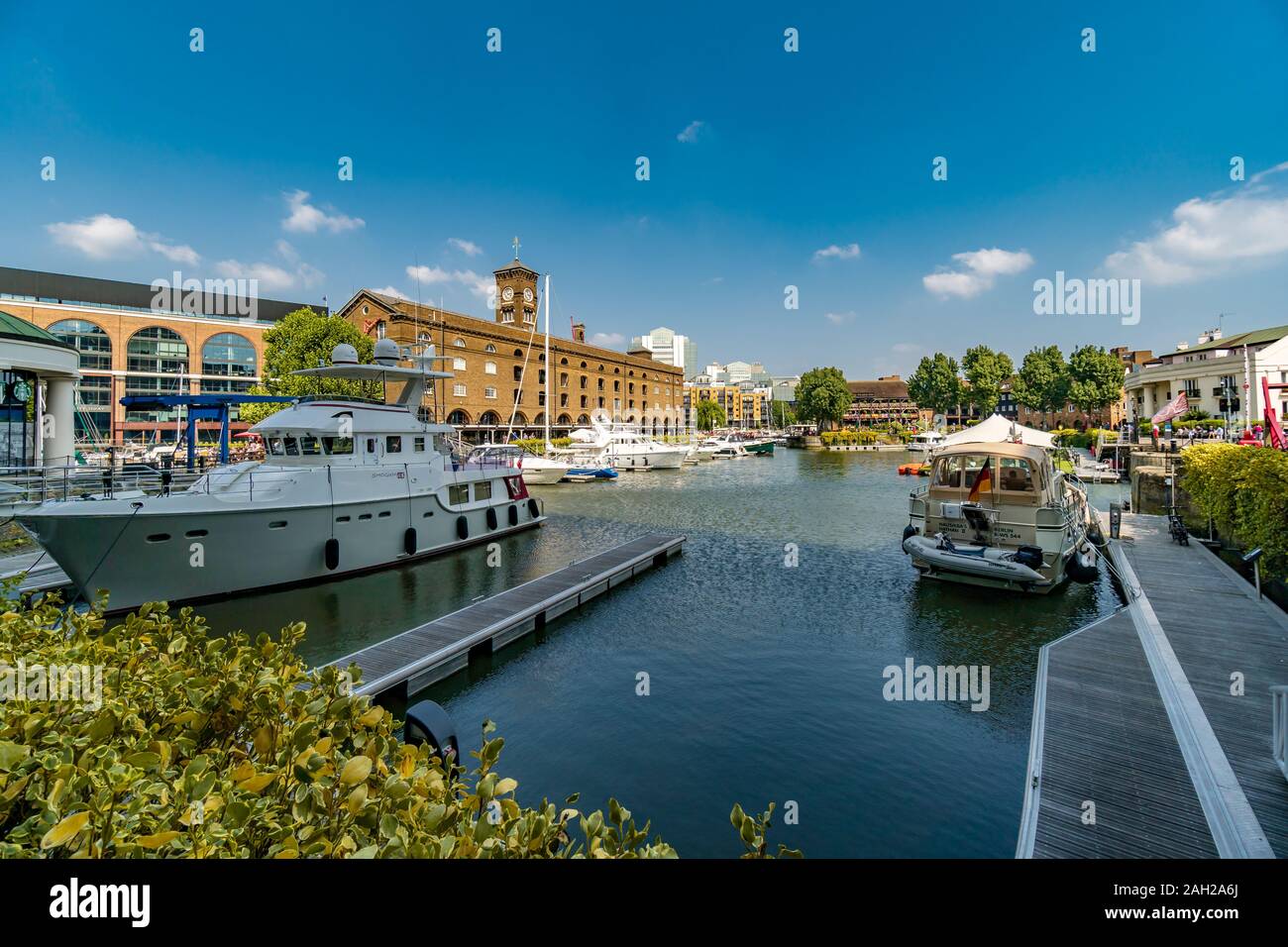 St Katharine Docks Marina Wharf near Tower Bridge in London with some ...
