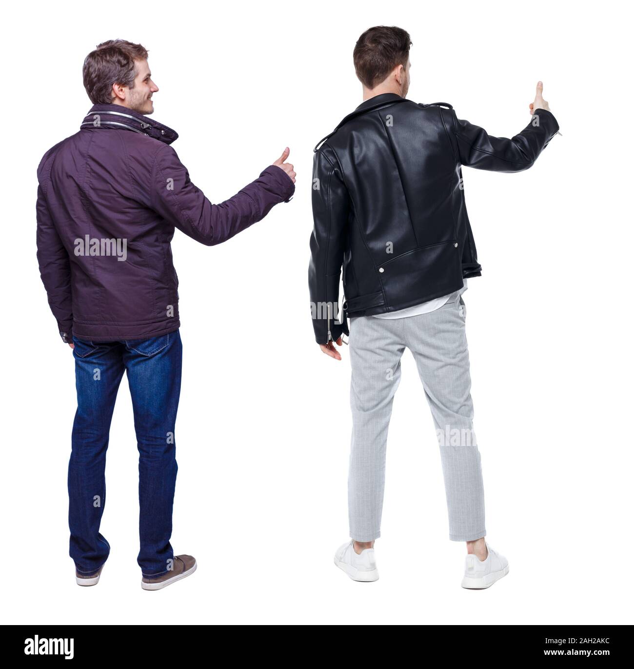 Back view of two man in winter jacket showing thumb up. Rear view ...