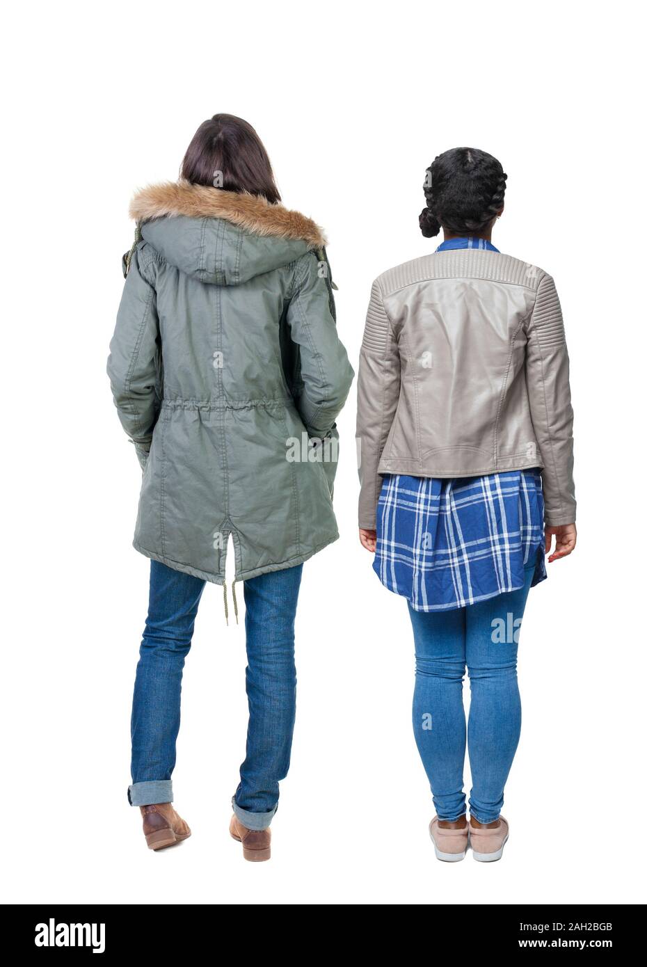 Back view of two young girl in winter jacket. Rear view people ...