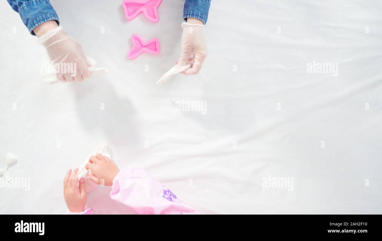 Flat lay. Step by step. Making mermaid tail from modeling clay in ...