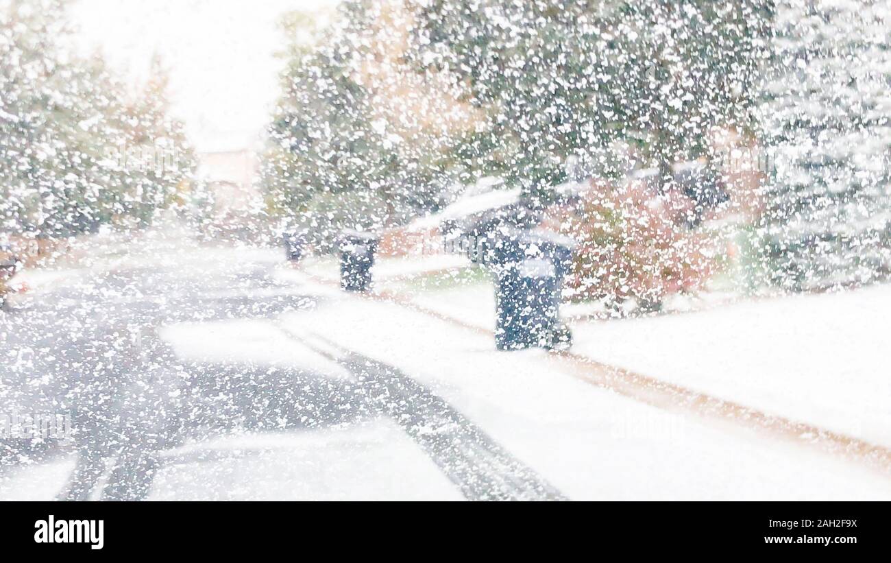 Driving in typical North American suburbs during the first snowstorm of ...