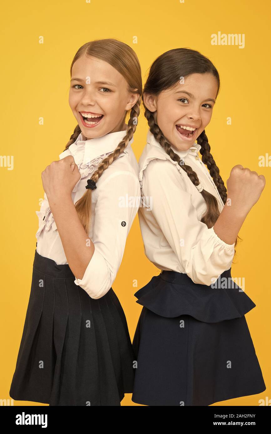 Best pupils award. Excellent pupils. Girls perfect uniform outfit on ...