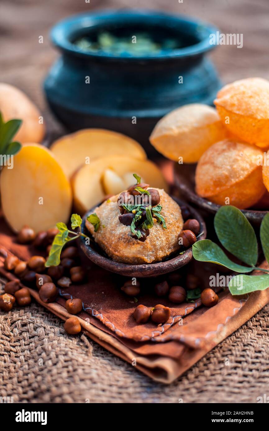 Famous Indian & Asian street food dish i.e. Panipuri snack in a clay ...