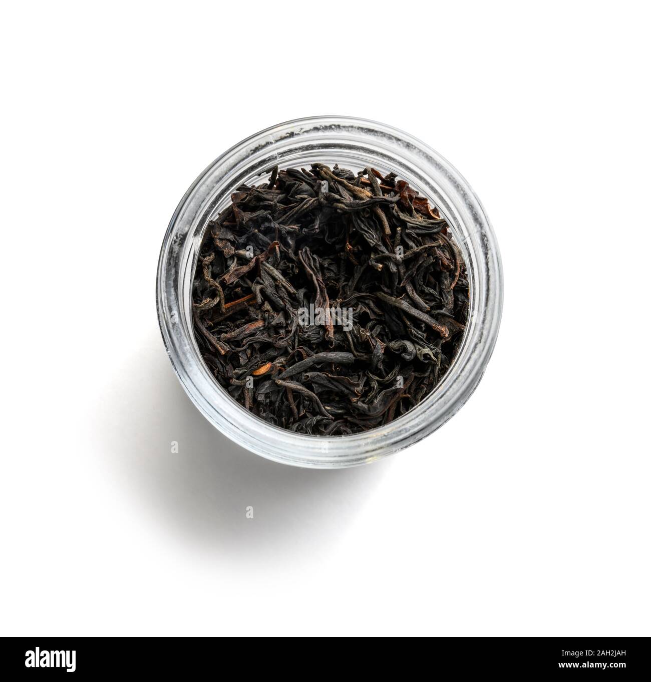 Black tea top view on white background Stock Photo - Alamy