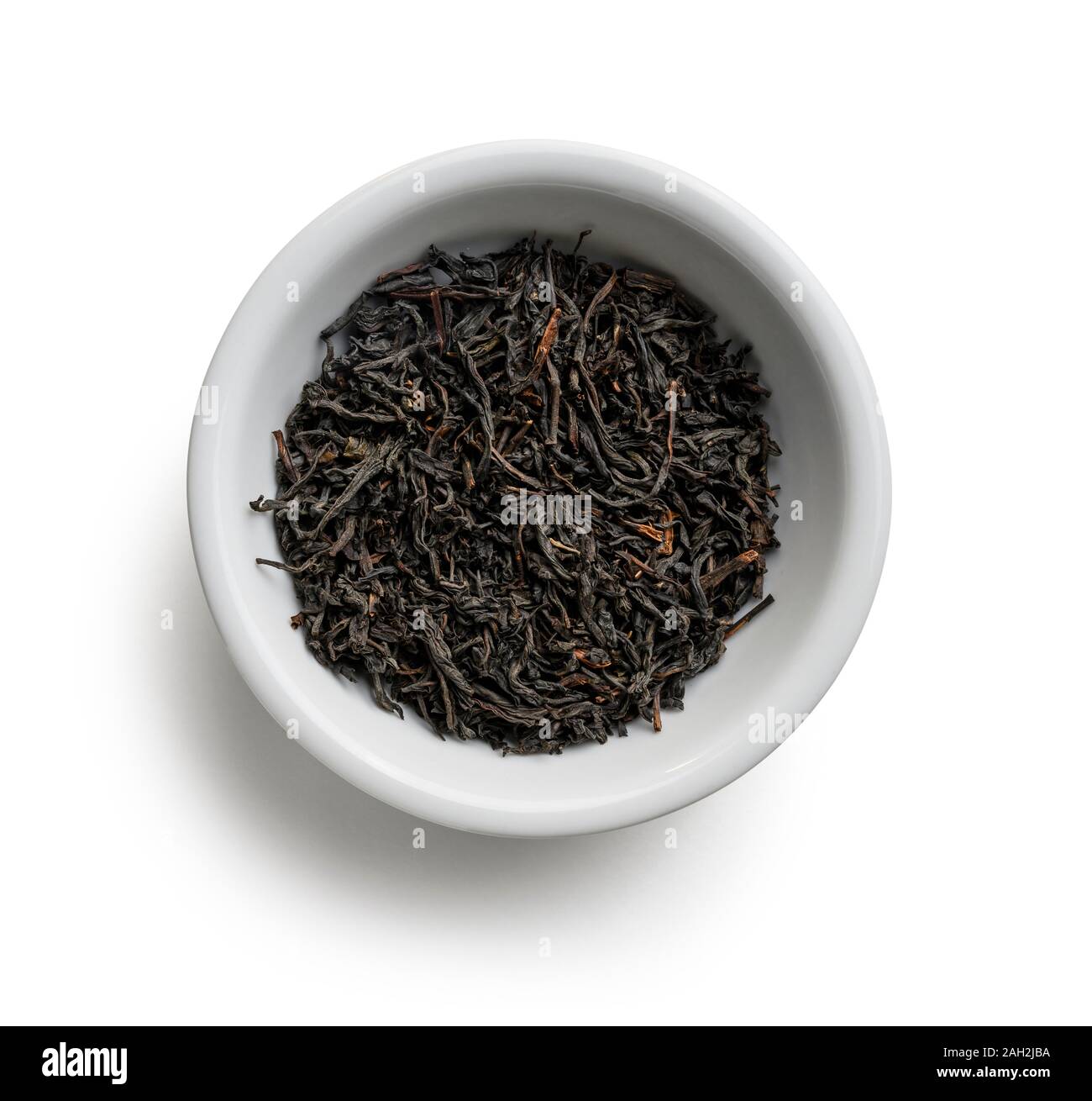 Black tea top view on white background Stock Photo - Alamy