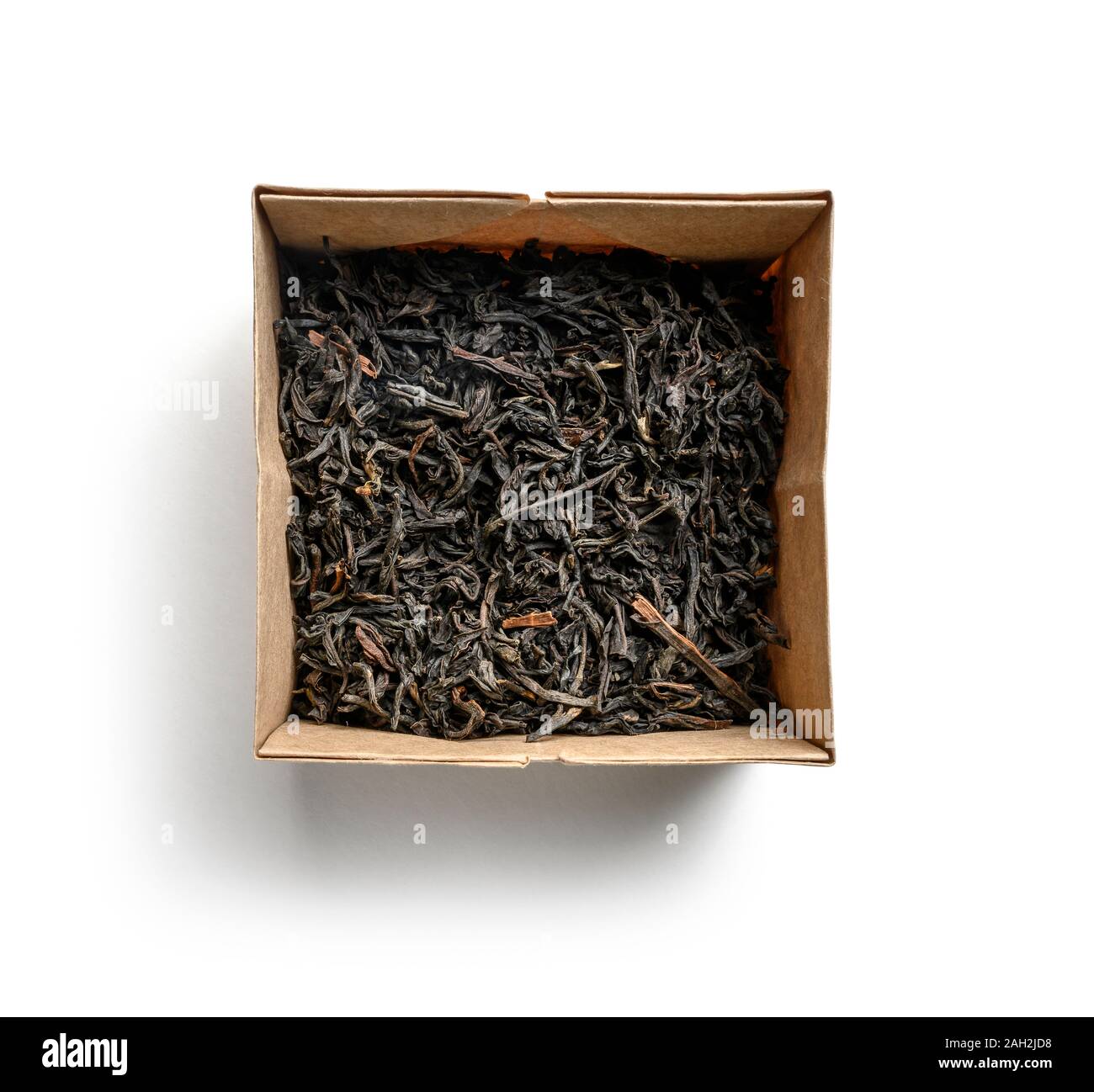 Black tea top view on white background Stock Photo - Alamy