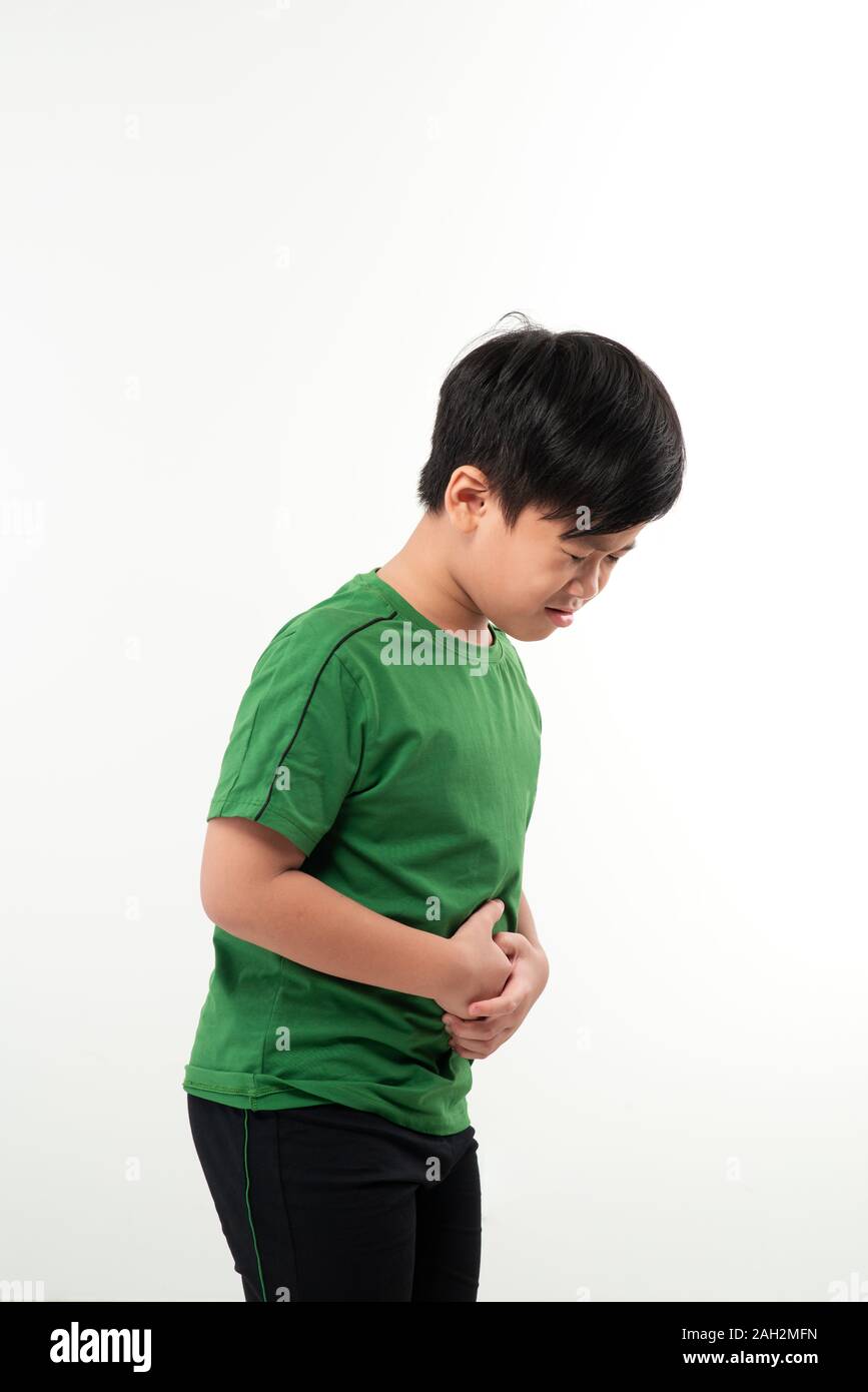 Adorable little boy suffering from abdominal pain, copy space. Young ...