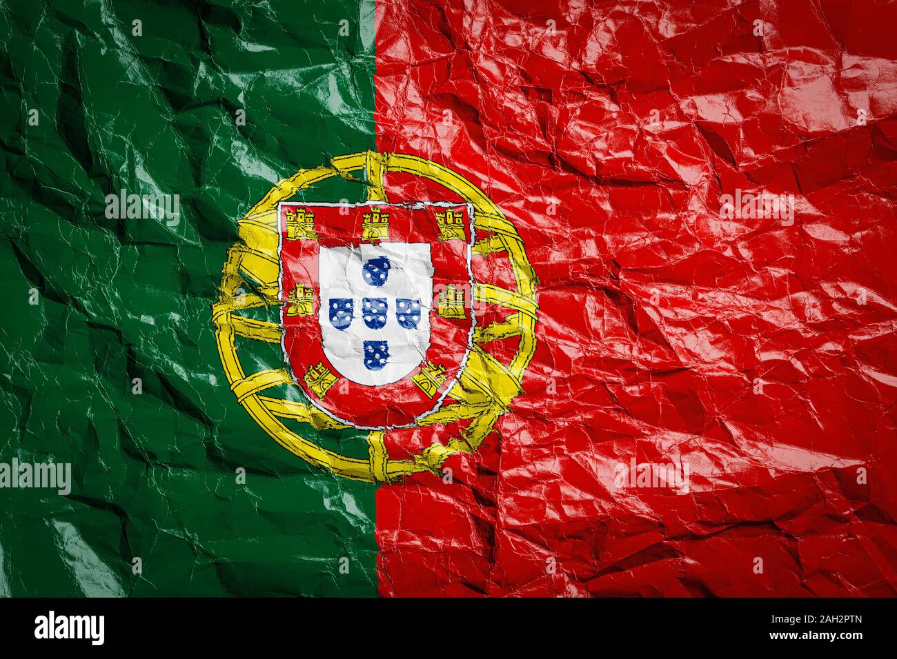 National flag of Portugal on crumpled paper. Flag printed on a sheet ...