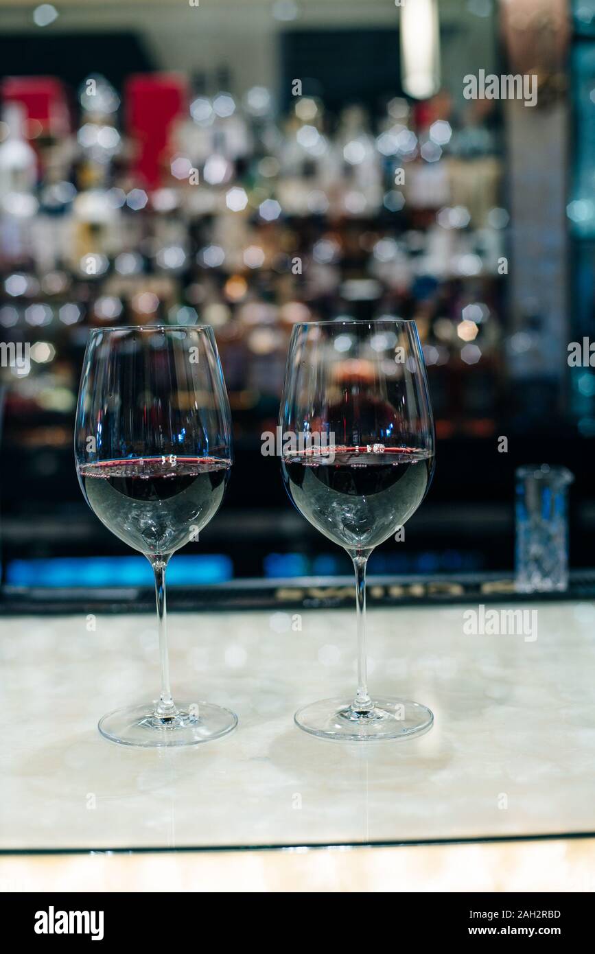 glasses with red wine on bar counter in restaurante Stock Photo - Alamy
