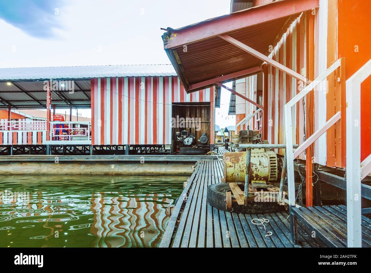 The old electricity generator for floating wooden raft house by using ...