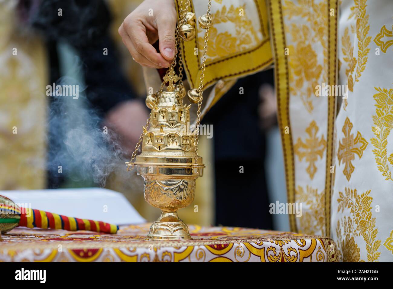 Details with a golden metallic christian orthodox frankincense burner ...