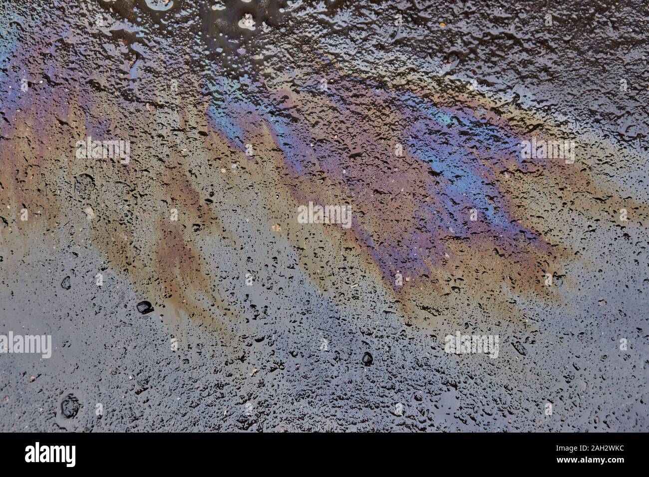 Colorful oil slick on pavement hi-res stock photography and images - Alamy