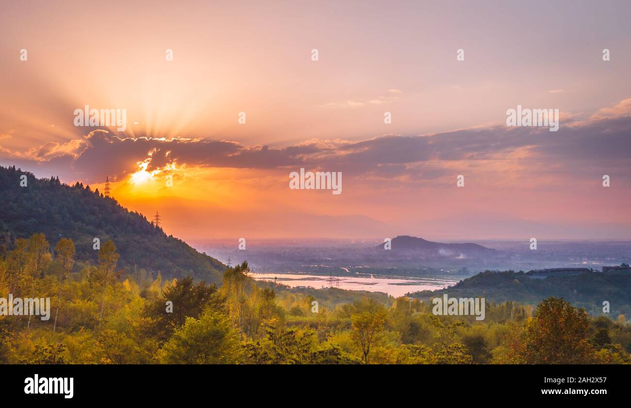 Sun setting over Dal Lake in Kashmir as seen from Sunset Point, Nishat ...