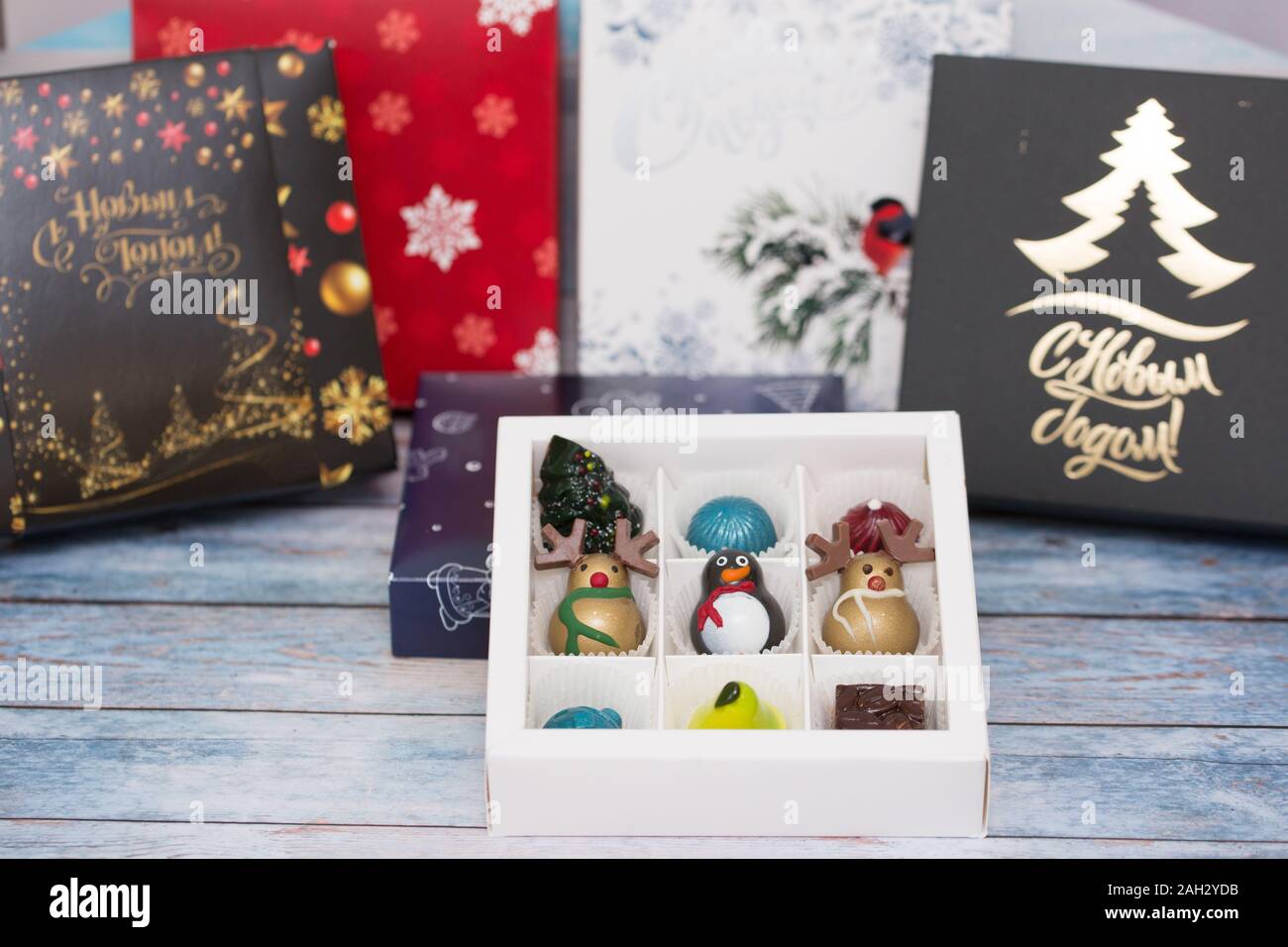 assortment of multi-colored exquisite chocolates, white, dark and milk ...