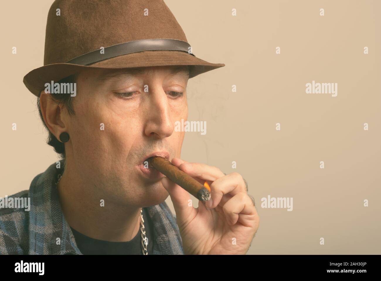 Gangster mafia man smoking cigar hi-res stock photography and images ...