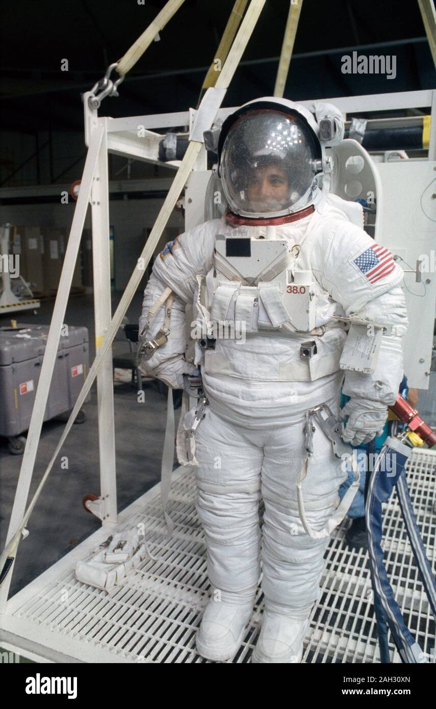 S92-40376 (March 1992) --- Attired in a training version of the ...