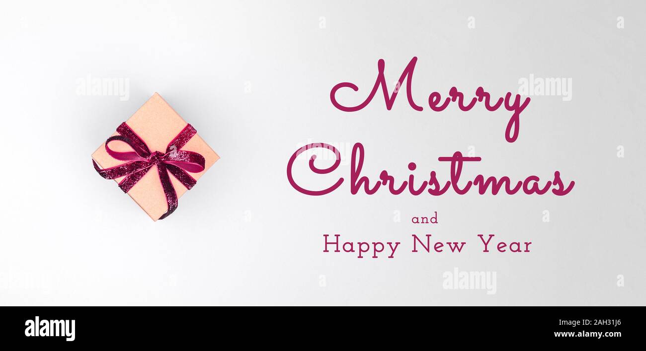 Craft boxes with dark red ribbon bows. Holiday, Christmas, New Year and ...