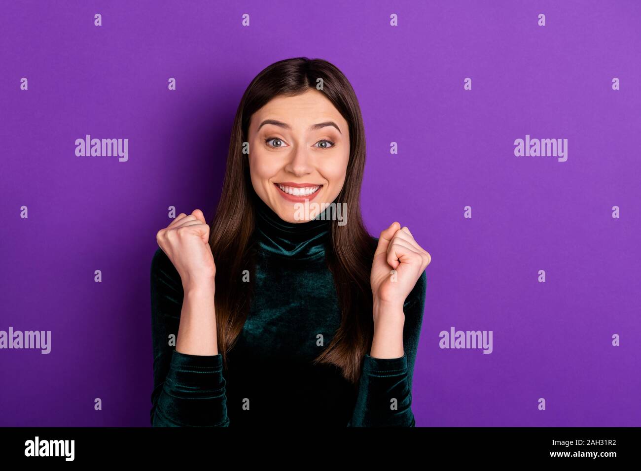 Close up photo of pretty crazy youth raising her fists with toothy ...