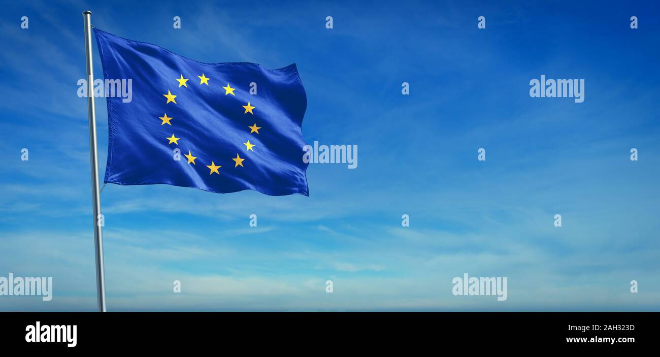 The National flag of European Union blowing in the wind in front of a ...