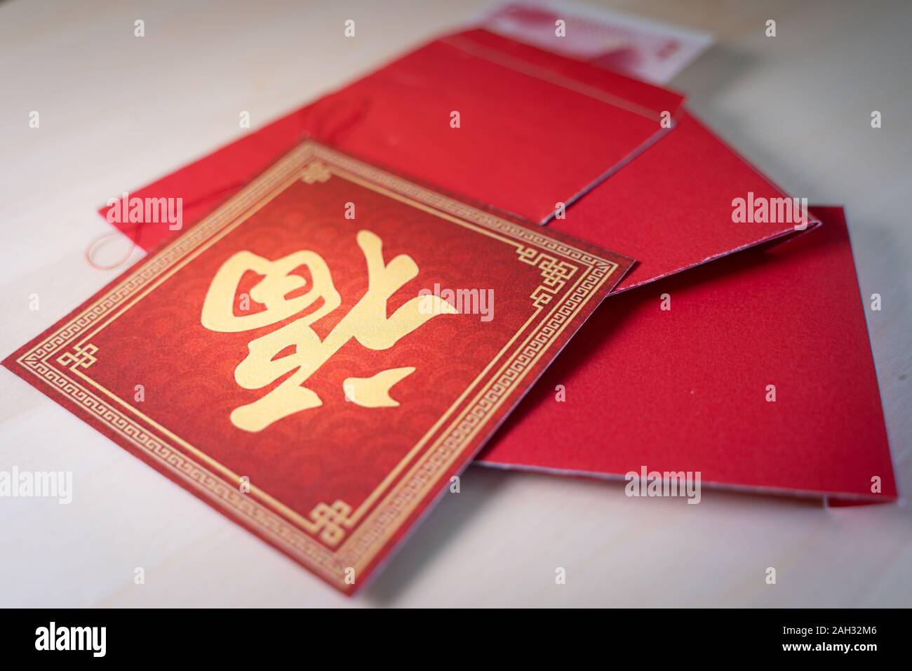 Chinese new year decoration with red envelopes and character FU ...
