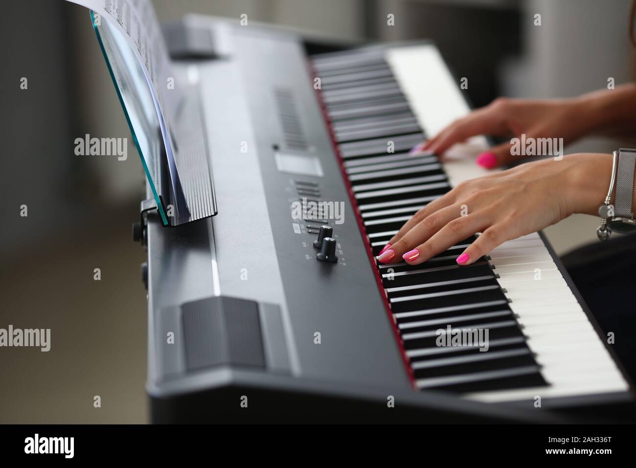 Beautiful woman pianist playing piano hi-res stock photography and ...