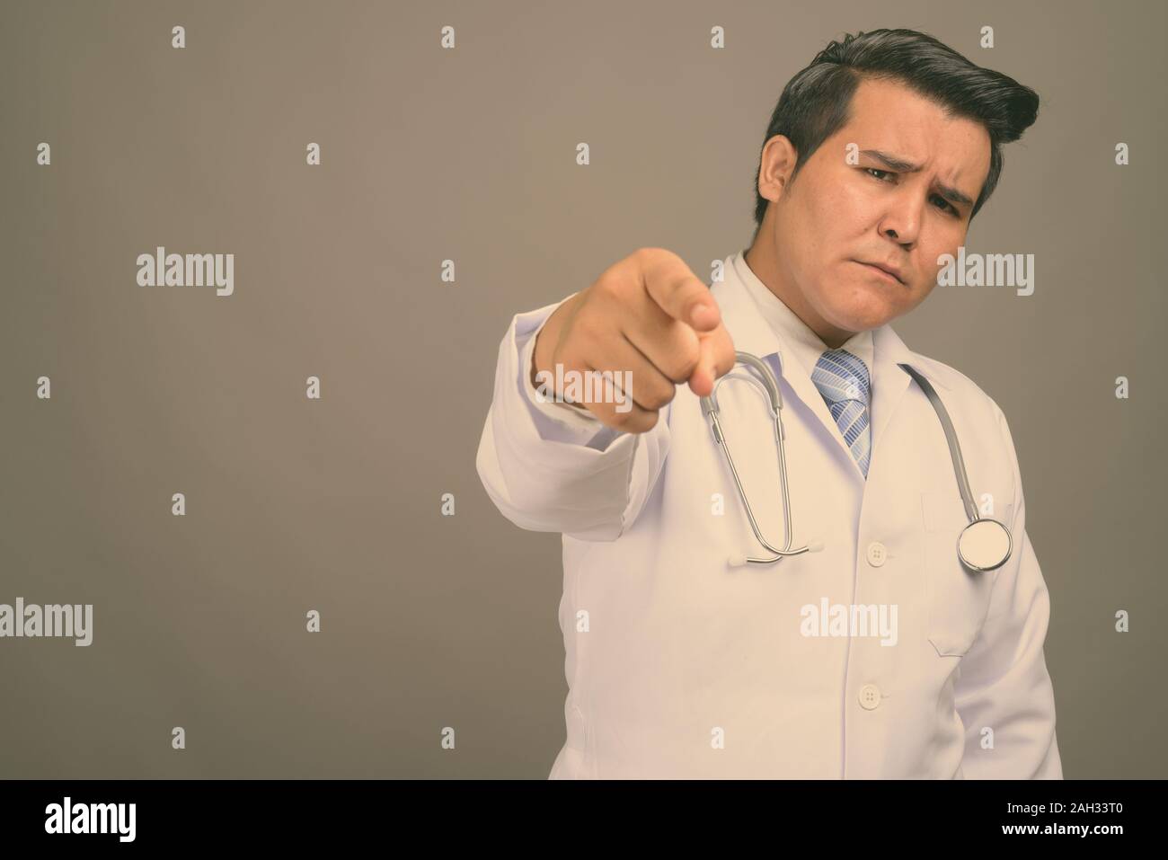 Angry pointing doctor young man hi-res stock photography and images - Alamy