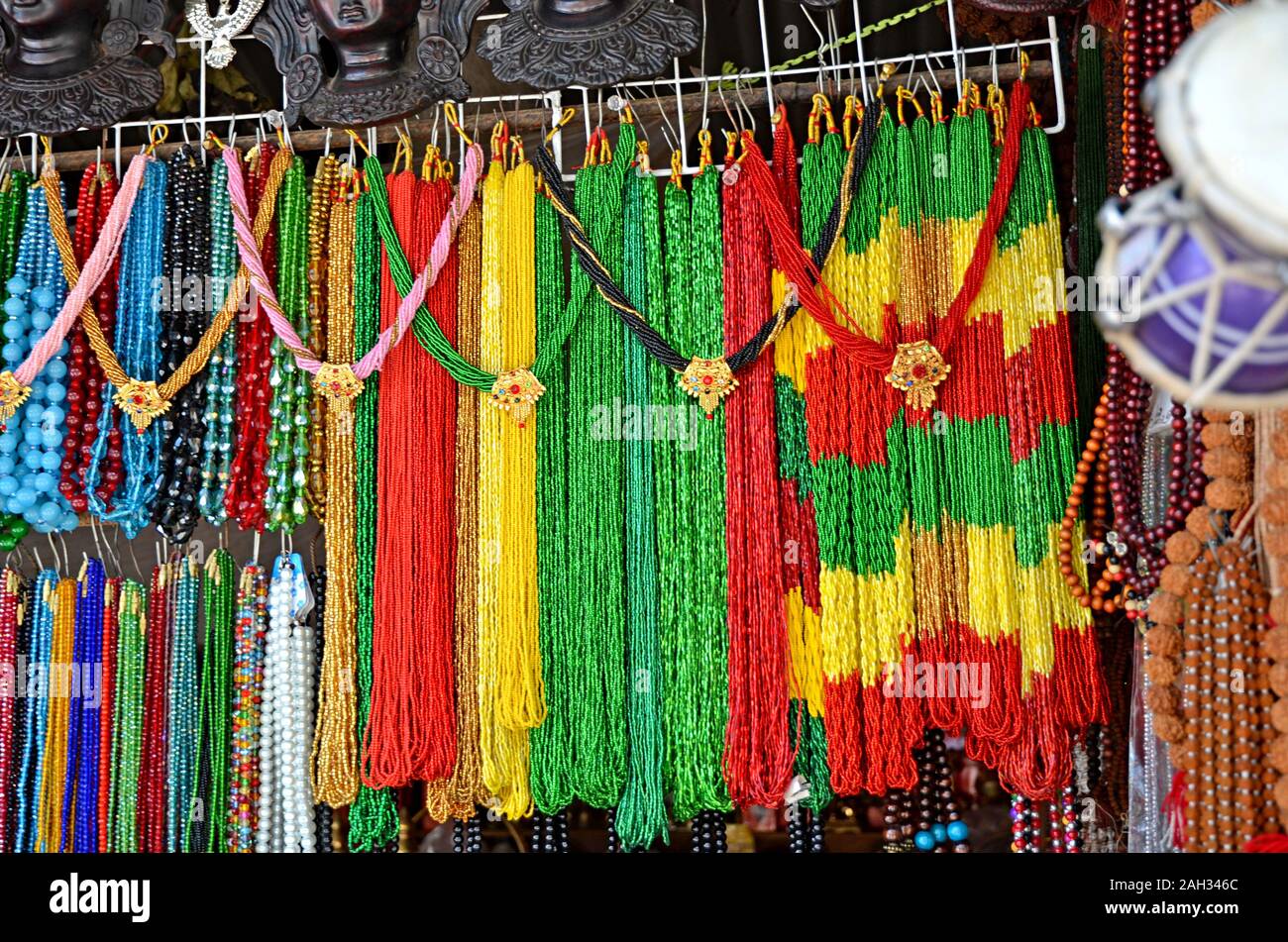 Stall with beautiful bright seed bead jewellery at the market in ...