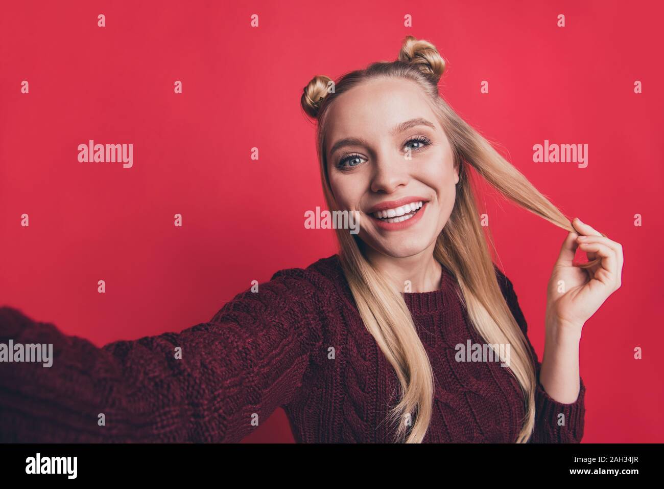 Closeup photo of pretty lady funny hairdo making selfies playing with long curl wear burgundy ...