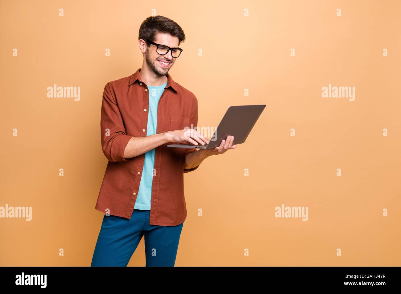 Nice intelligent man holding hi-res stock photography and images - Alamy