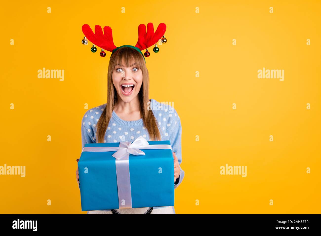 Giftbox from secret Santa concept. Photo of cheerful screaming ...