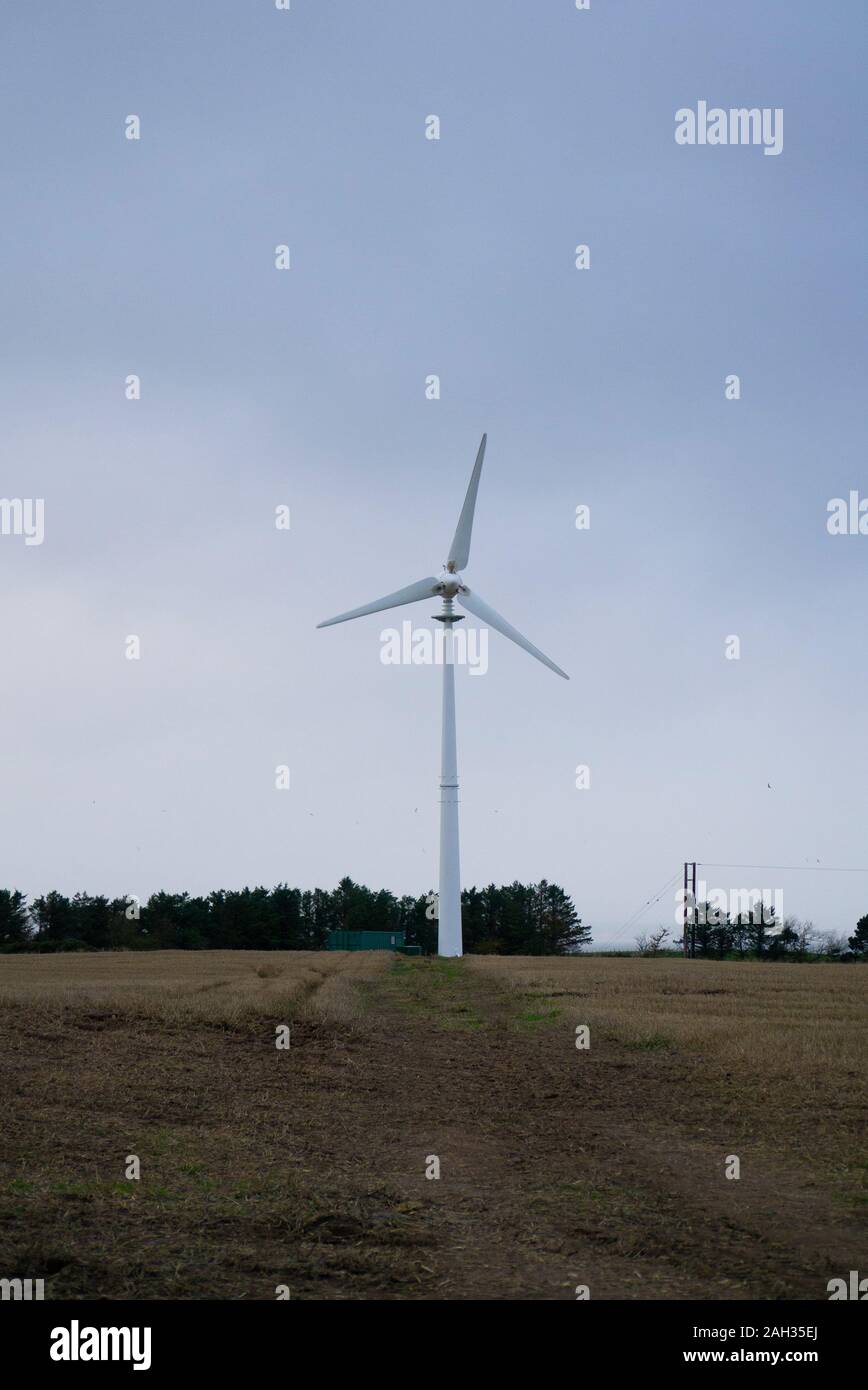 Small wind turbine on a farm in Easter Ross Scotland UK Stock Photo - Alamy