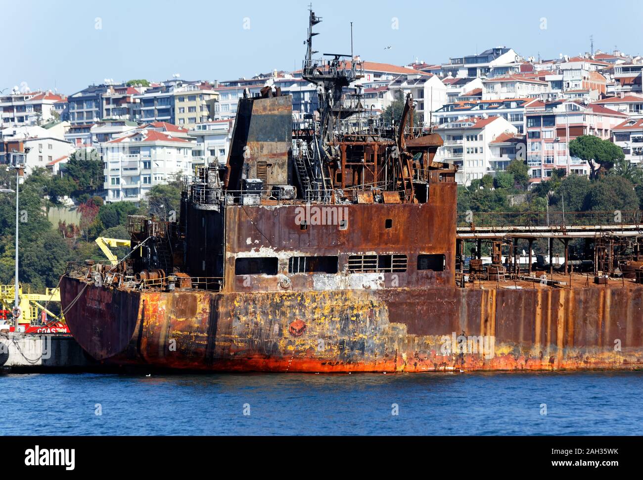 Rusty old abandoned oil tanker pulled to harbor in Haydarpasa Port ...