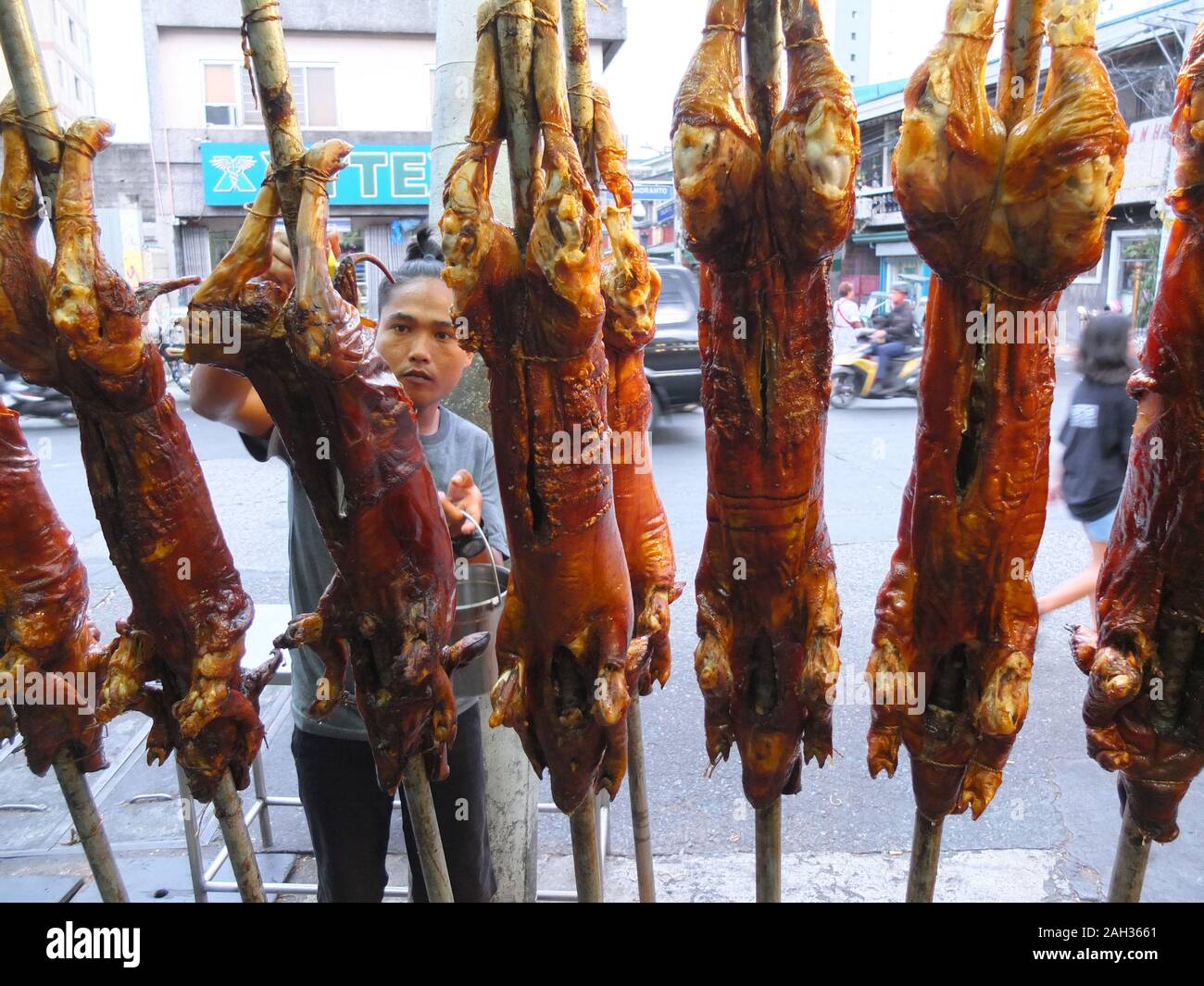 Rows of lechon displayed in Quezon City.In the Philippines, during the ...