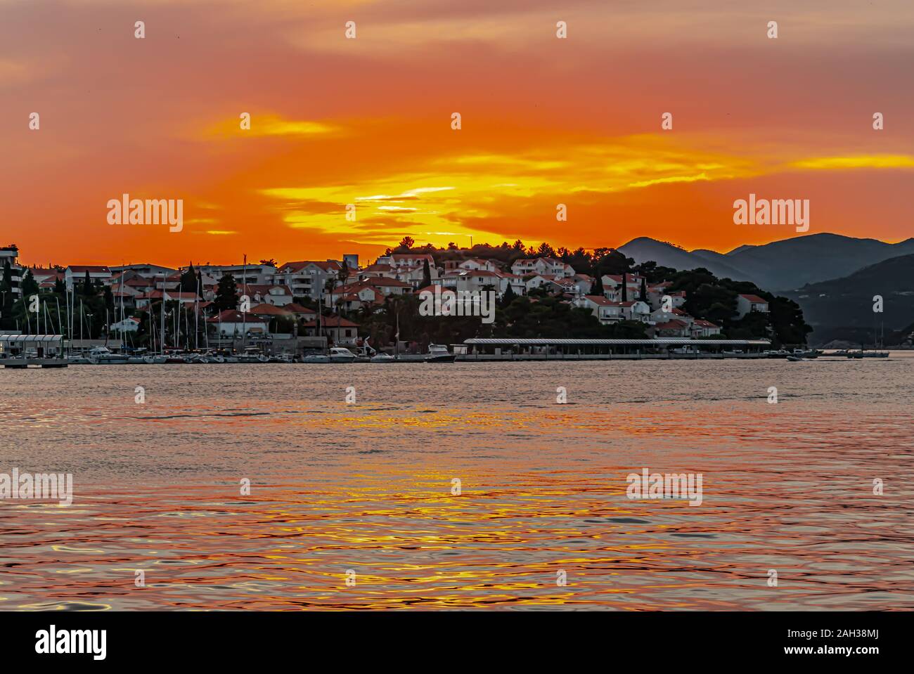 Sunset over Lapad Stock Photo - Alamy