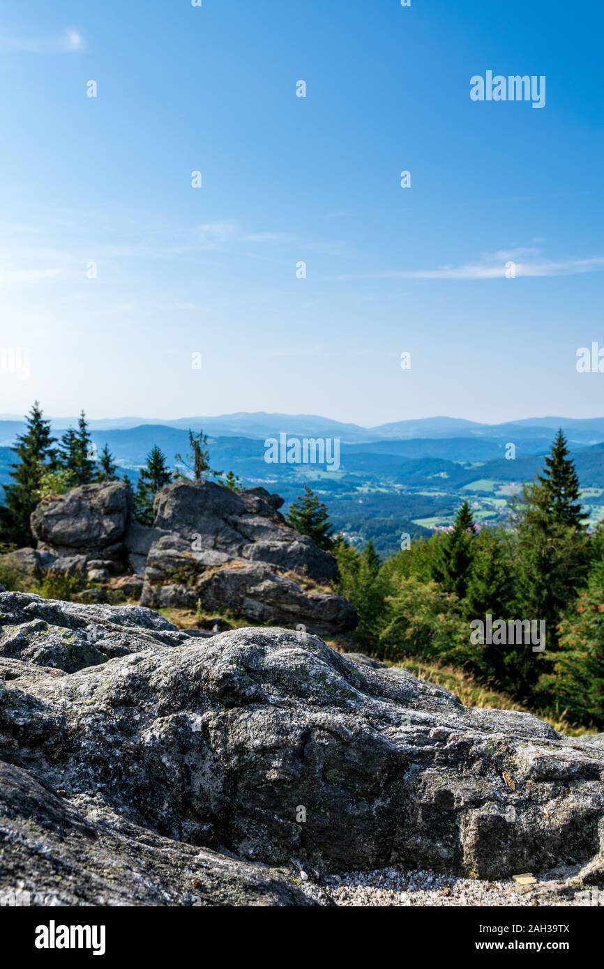 Stone and Rocks in front of a great landscape with clouds on the sky in ...