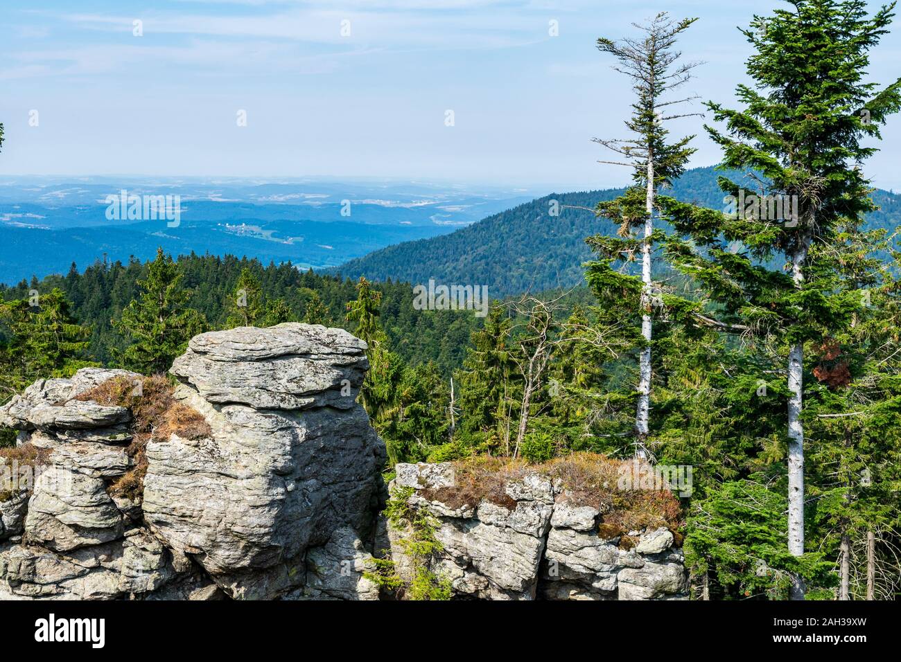 Stone and Rocks in front of a great landscape with clouds on the sky in ...