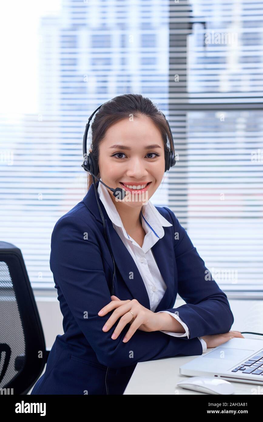 Asian female agent talking hi-res stock photography and images - Alamy