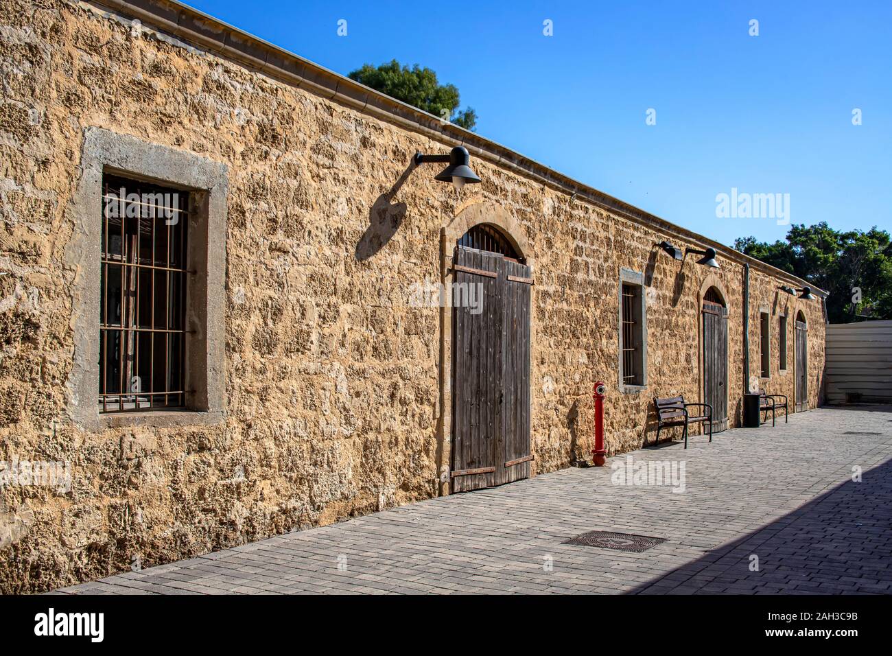 Ancient buildings with stone walls of Jerusalem stone, wooden doors and ...