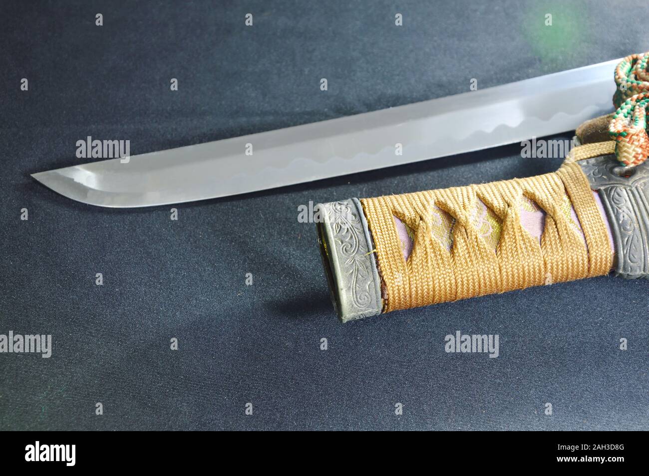 Katana Japanese sword blade and scabbard on black fabric Stock Photo ...