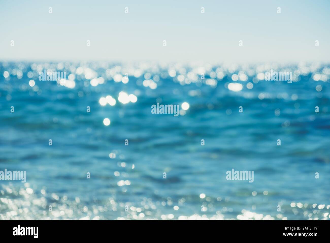 Abstract bokeh background of summer blue sea water at the beach Stock ...