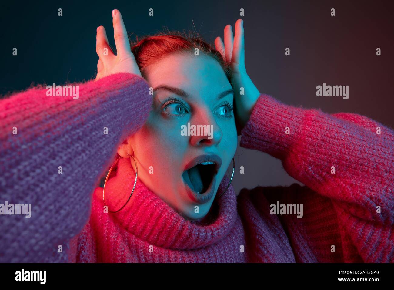 Shocked, close up. Caucasian woman's portrait isolated on gradient ...