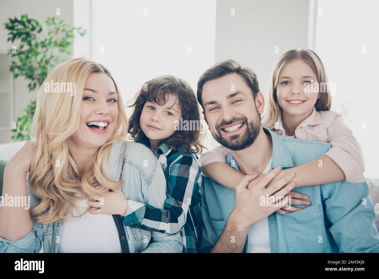 Photo of four family members after adoption having best time ...