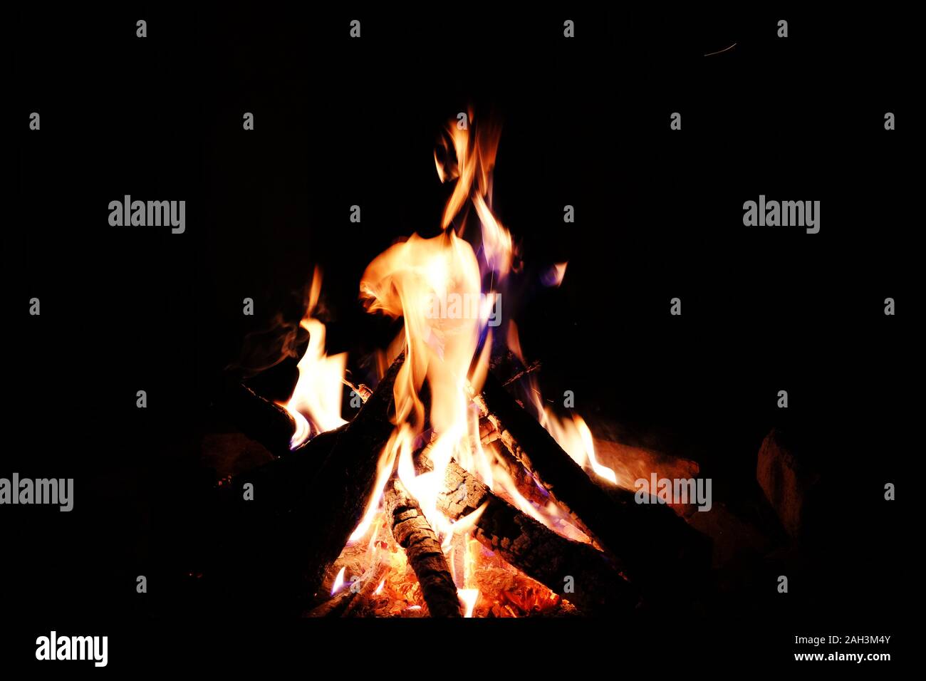 Fire flames close up over black background Stock Photo - Alamy