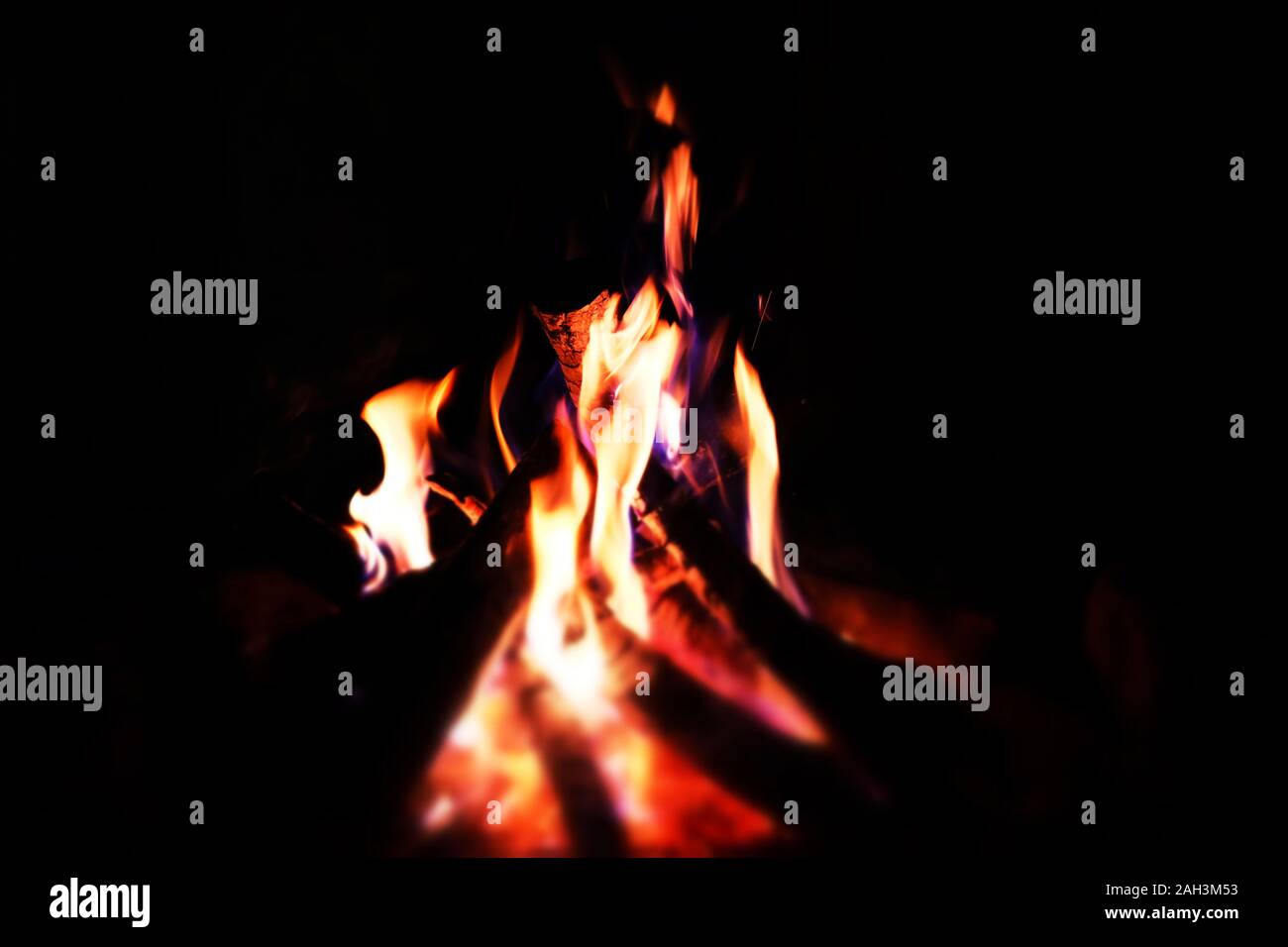 Fire flames close up over black background Stock Photo - Alamy
