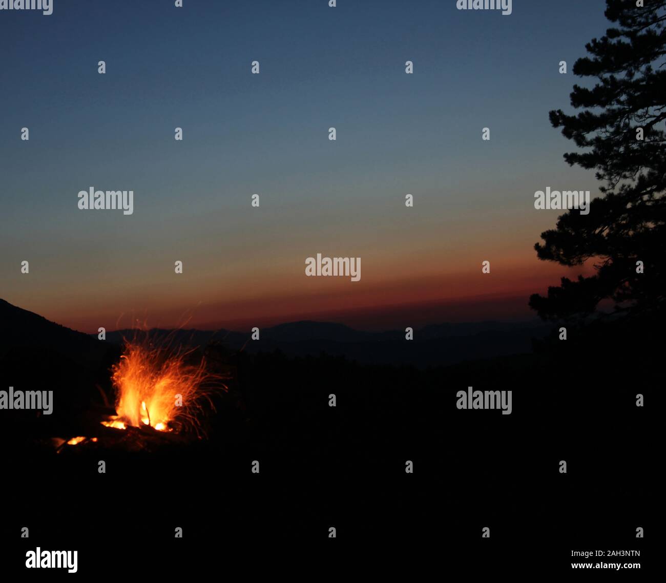 Sparks in campfire sunset camping hi-res stock photography and images ...