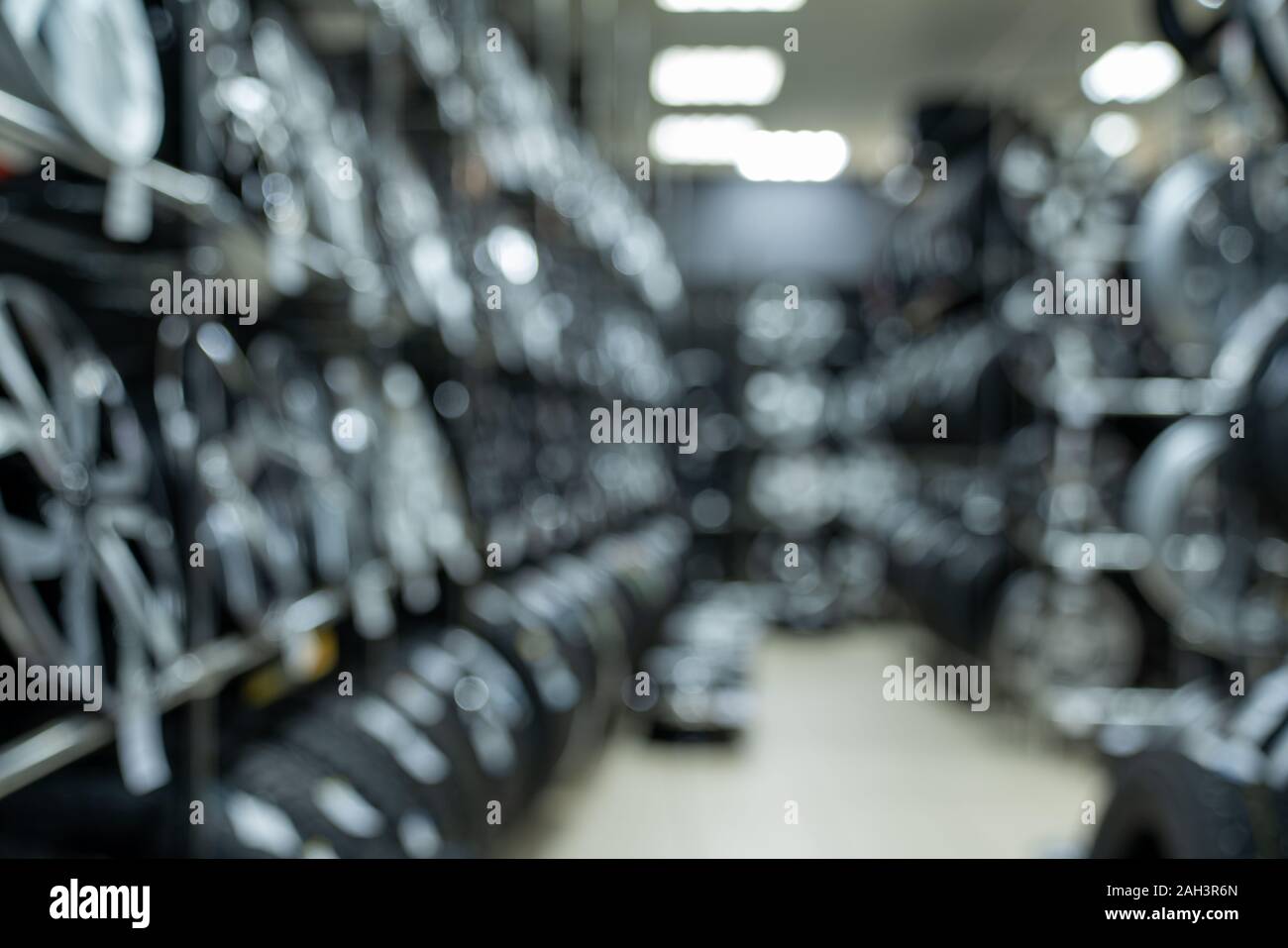 blurred background, the interior of the tire shop, easy auto parts ...