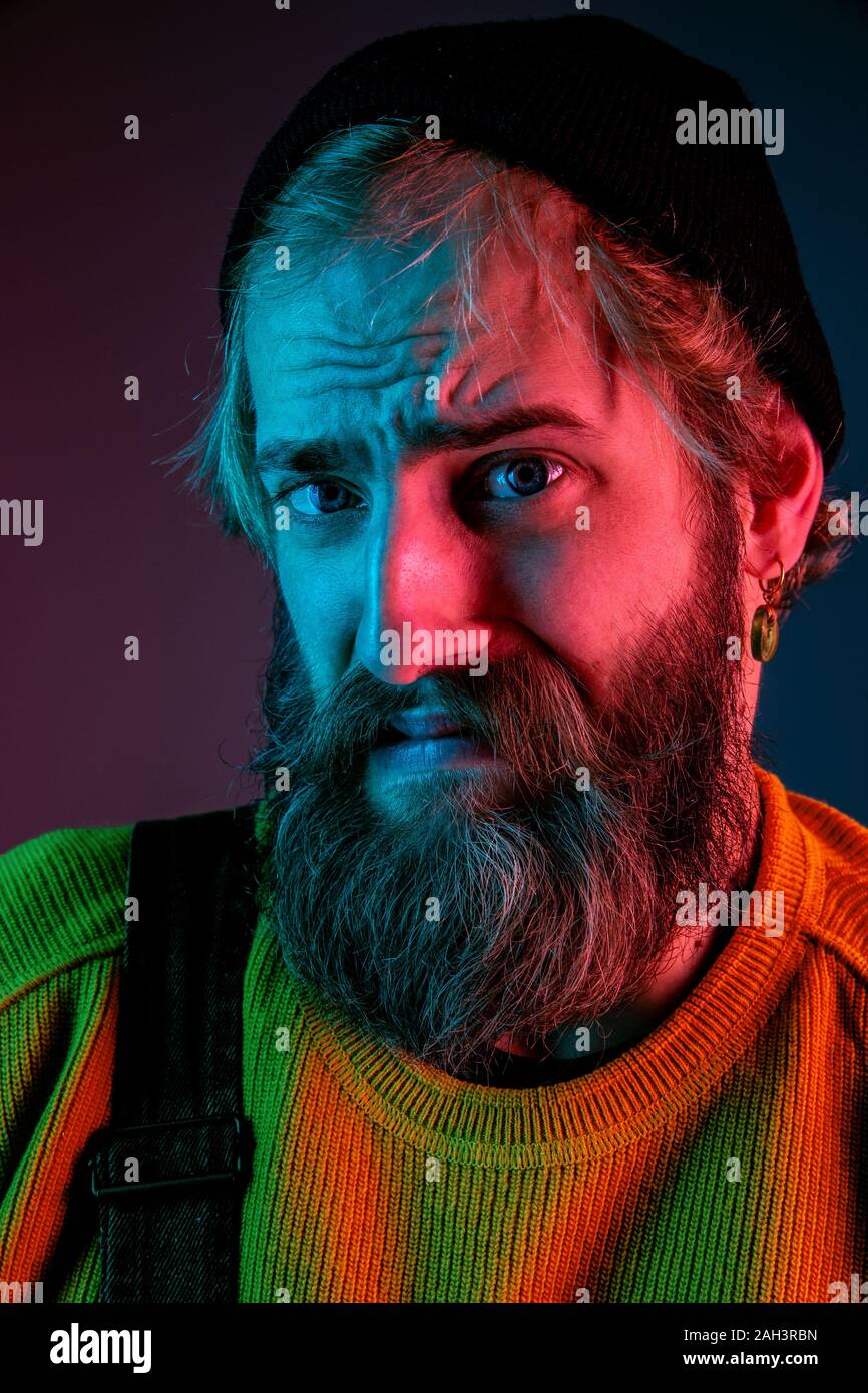 Shocked, disgusted, close up. Caucasian man's portrait on gradient ...