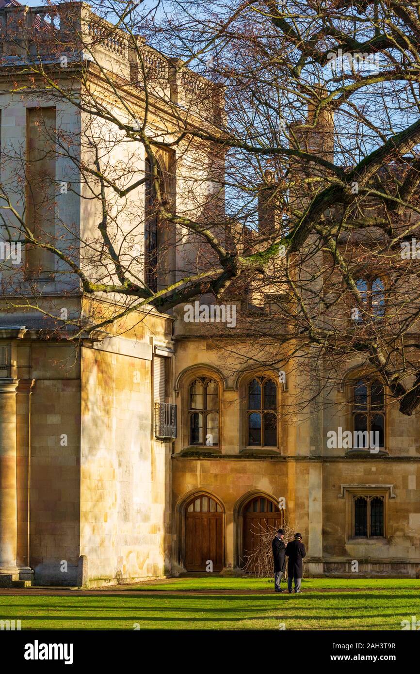 Trinity College Cambridge porters standing in the Winter sunshine Stock ...